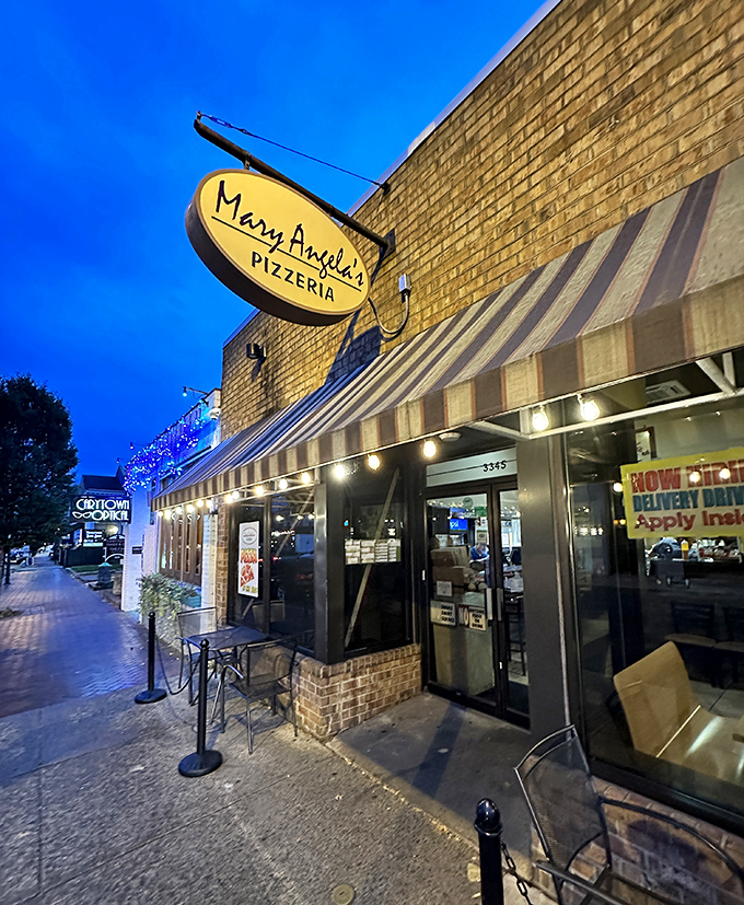Carytown's pizza jewel awaits behind that classic awning. Mary Angela's brick facade has witnessed countless pizza pilgrimages.