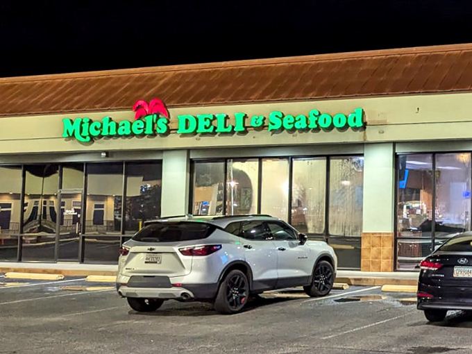 Michael's neon sign glows like a beacon for night owls craving seafood and sandwiches. Midnight munchies, solved!