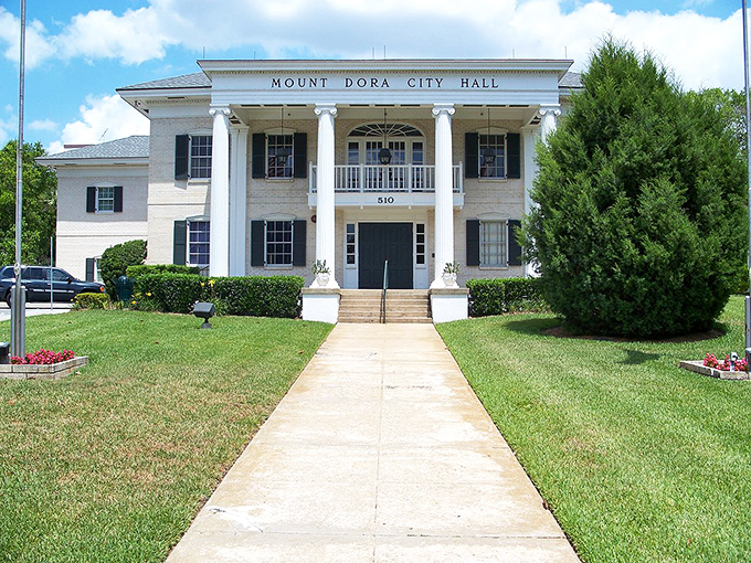 Mount Dora's City Hall commands respect with its stately columns - like the town's dignified answer to Tara, minus the drama.