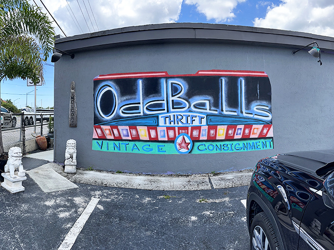 That colorful mural practically shouts "quirky treasures await" in a language every thrift store lover understands perfectly.