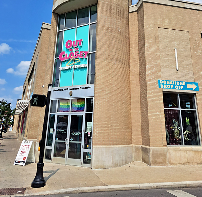 Out of the Closet's vibrant turquoise and pink signage brightens the streetscape. Shopping with purpose never looked so inviting!