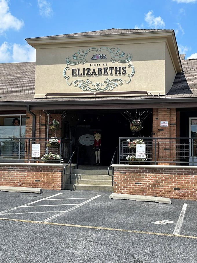 Elizabeth's elegant signage hints at pizza that's dressed better than most of us. Flower baskets welcome you to pizza sophistication.