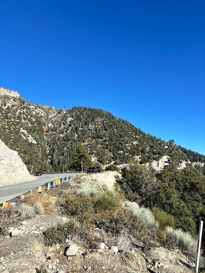 The road less traveled often has the best views. Rim of the World Highway delivers exactly what its name promises.