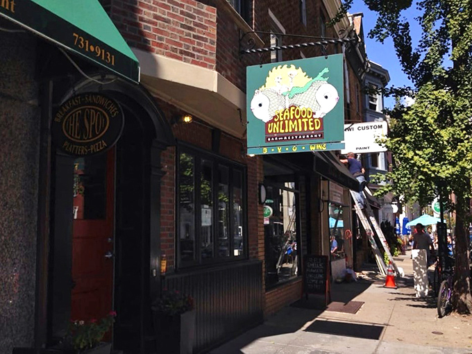 Seafood Unlimited (storefront): "Nestled between city shops, this unassuming gem proves the best seafood spots don't need to shout for attention!"