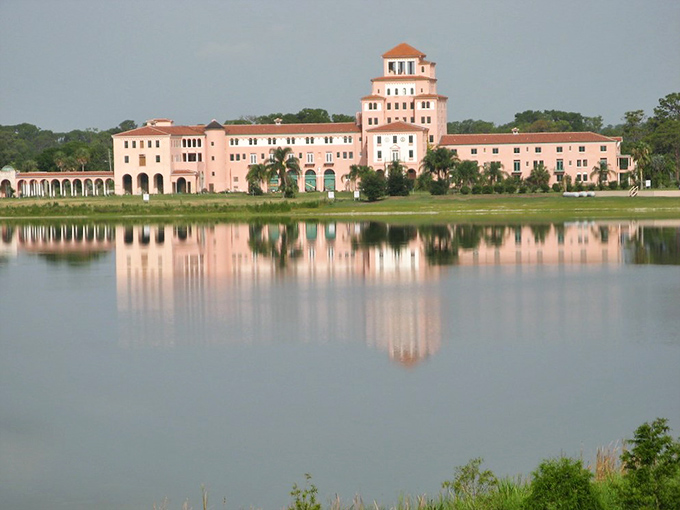 The historic pink architecture reflects beautifully in still waters, creating postcard-worthy views accessible on a modest budget.