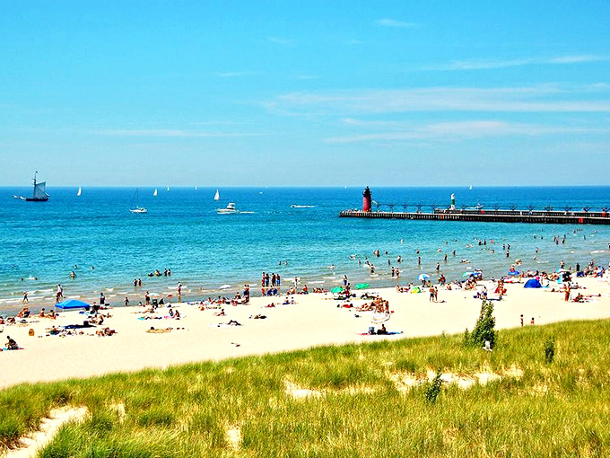 Families soak up the sun, sailboats dance on the horizon, and the iconic red lighthouse stands watch over the sparkling shores&mdash;South Haven is pure lakeside magic.