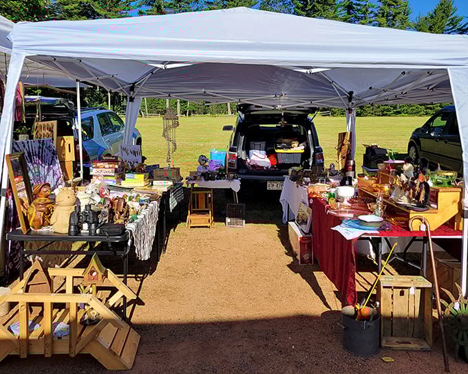 St. Germain's market transforms parking lots into treasure fields where shoppers hunt for everything from fishing lures to vintage signs.