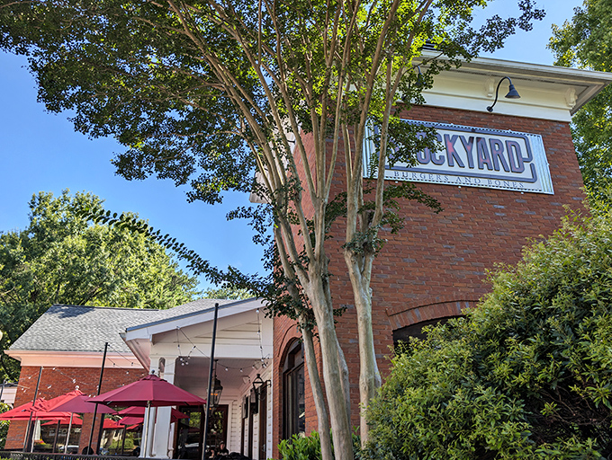 Stockyard's brick-and-mortar temple to beef stands proud. Those red umbrellas signal the perfect spot for carnivorous contemplation.