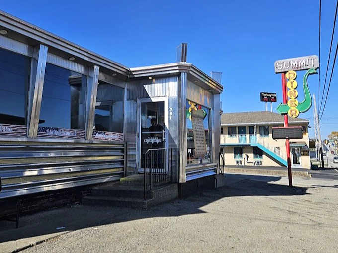 The Summit Diner's stainless steel exterior gleams with promises of hot coffee and conversations that matter.