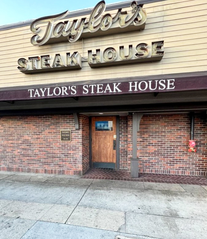 Taylor's brick exterior keeps a low profile in bustling LA. Behind that wooden door lies a meat lover's sanctuary that Hollywood insiders have treasured for decades.