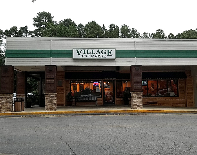Village Deli's stone columns frame the entrance to Reuben paradise &ndash; your cardiologist might disagree, but your taste buds won't.