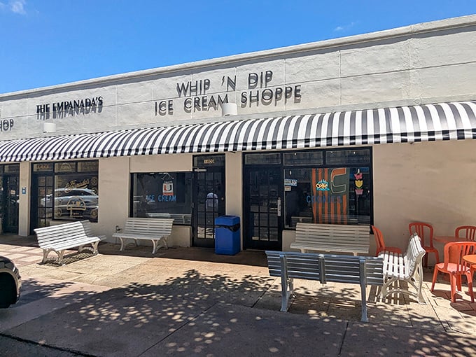 Whip 'n Dip's classic black and white awning signals old-school ice cream perfection hiding in plain sight.