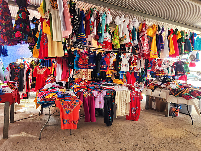 Textile rainbow alert! Traditional Mexican dresses create a kaleidoscope of color that would make Frida Kahlo stop and shop.