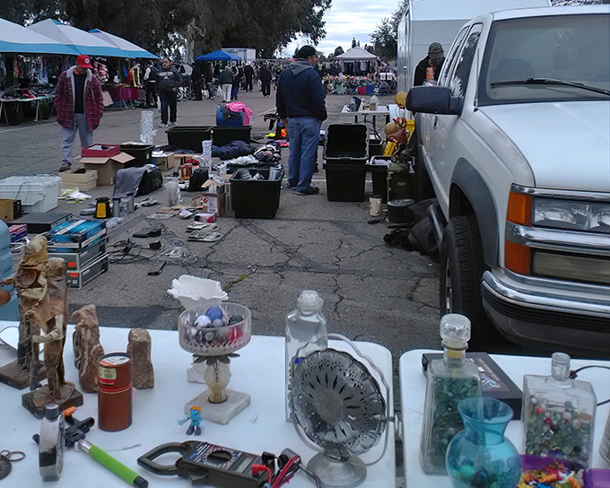 Flea market finds spread across tables at Fresno's market&mdash;from vintage fans to glassware, each item has a story waiting to be continued.