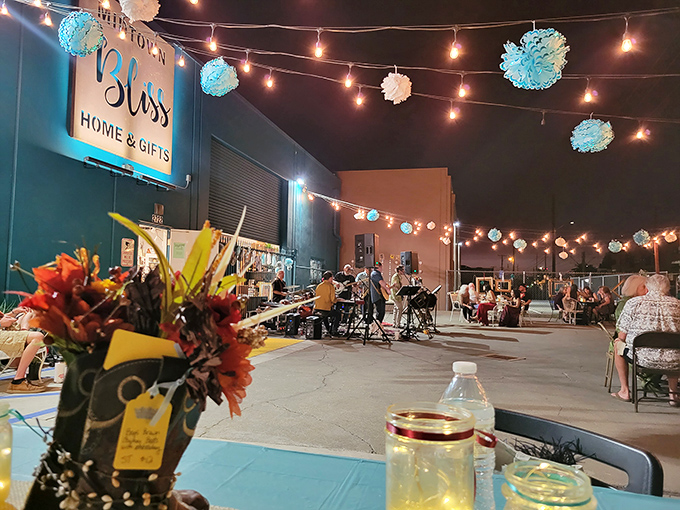 Evening magic at Bliss Marketplace &ndash; string lights transform this thrift haven into an enchanted gathering space for treasure hunters and storytellers alike.
