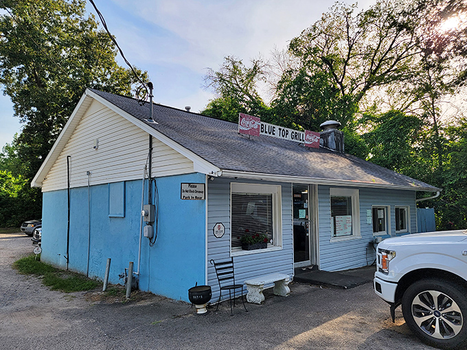 That blue and white exterior isn't trying to impress anyone—until you taste what comes from their kitchen. Then you're a believer for life.