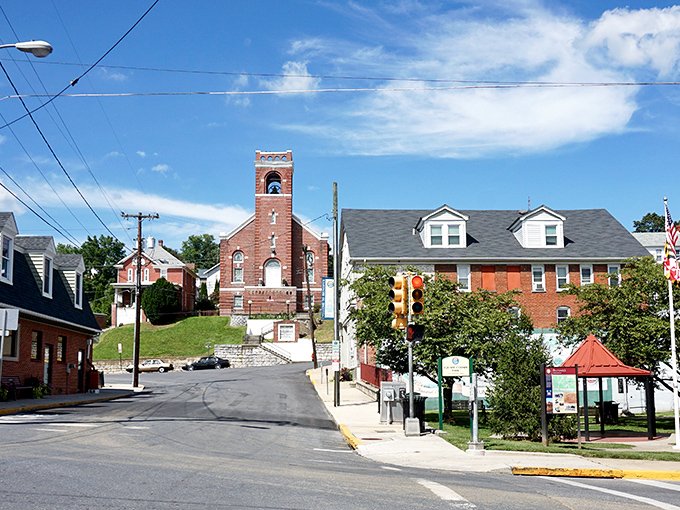 The tree-lined streets of Brunswick whisper tales of railroad glory days. That church on the hill has seen more comings and goings than Grand Central Station.