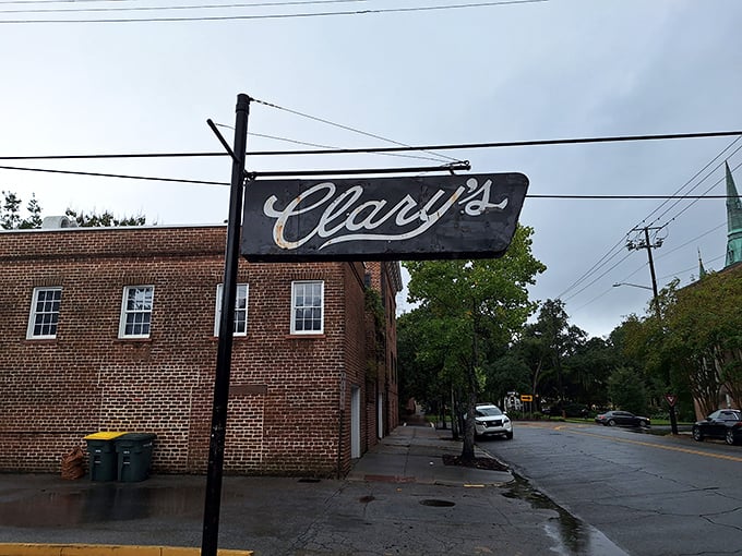 Rain or shine, that iconic "Clary's" sign has guided breakfast pilgrims through Savannah's historic streets.