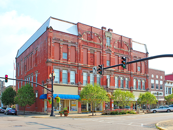 Highway signs mark the crossroads of Coshocton, where three routes converge but nobody's in a hurry to get anywhere else.