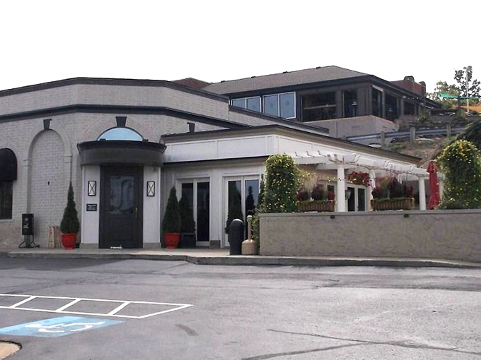 The understated elegance of Delmonico's exterior only hints at the flavor explosions waiting inside.