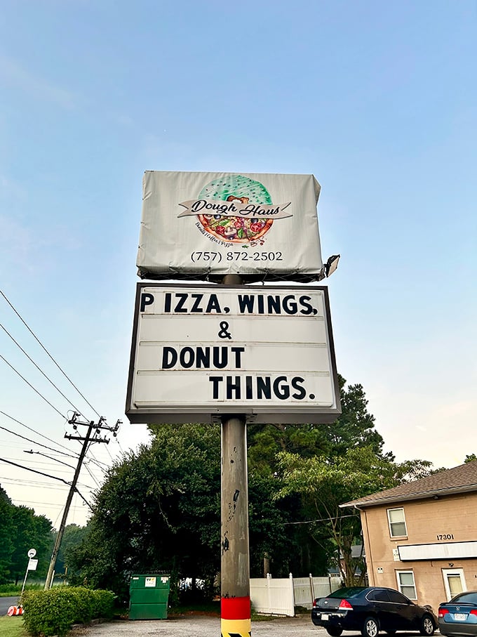 The sign promises pizza, but locals know the real morning magic happens when those donut fryers fire up. Sweet and savory paradise!