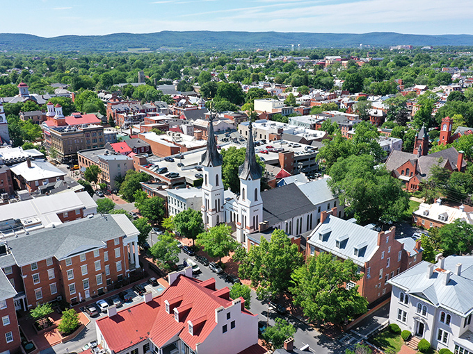 Red brick buildings and historic charm define Frederick's skyline, where small-town atmosphere comes with surprisingly reasonable housing costs.