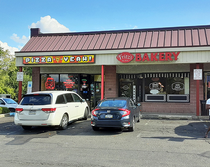 Pizza Yeah! on one side, Fritz's Bakery on the other—this building houses the ultimate cheat day one-two punch!