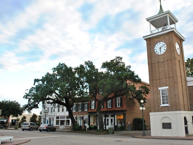 The iconic clock tower stands tall in Georgetown&rsquo;s historic district, where southern charm meets timeless beauty along these welcoming streets. 