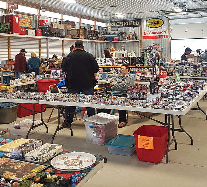Blue tarps and cardboard boxes &ndash; the universal symbols of "amazing deals might be hiding here" at Jake's Flea Market.