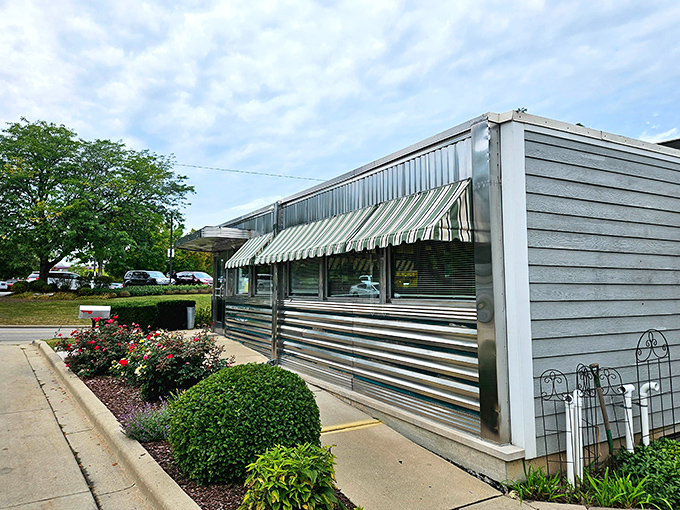 The quintessential American diner silhouette—Joni's aluminum siding has weathered decades while the pancakes inside remain consistently perfect.
