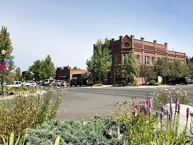 Historic brick buildings line a main street that looks like it was designed specifically for your next holiday card.