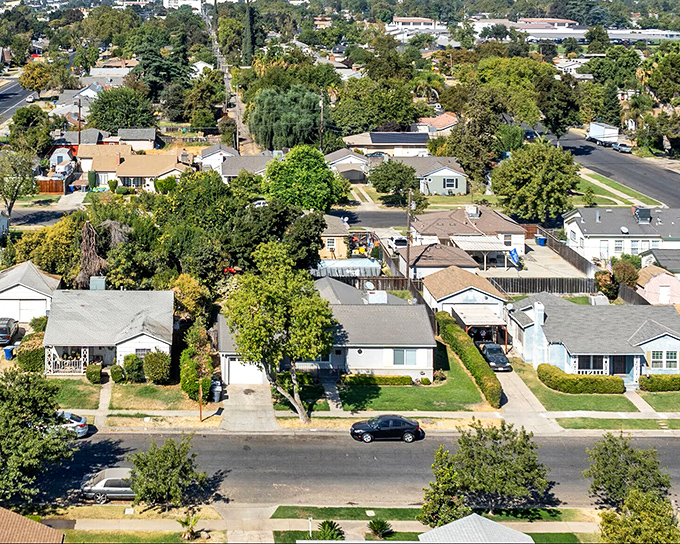 Merced's tree-lined streets and historic buildings create that "Hometown USA" vibe that big cities charge a premium for.