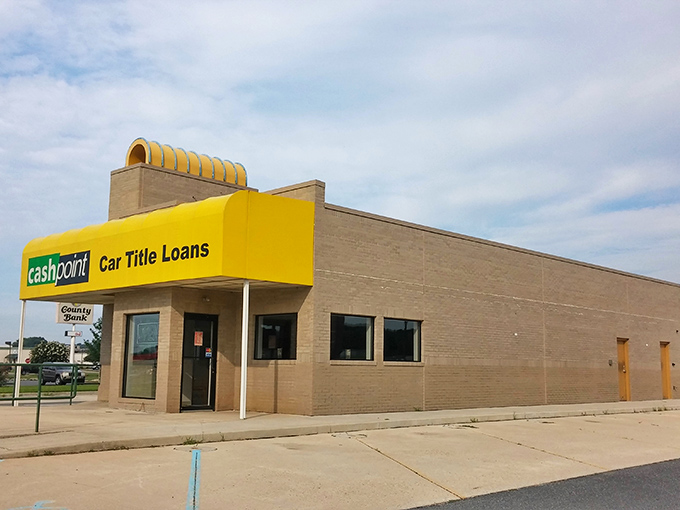 The historic Cashpoint building facades in Milford tell stories that no smartphone app could ever replicate - this is authentic small-town America.