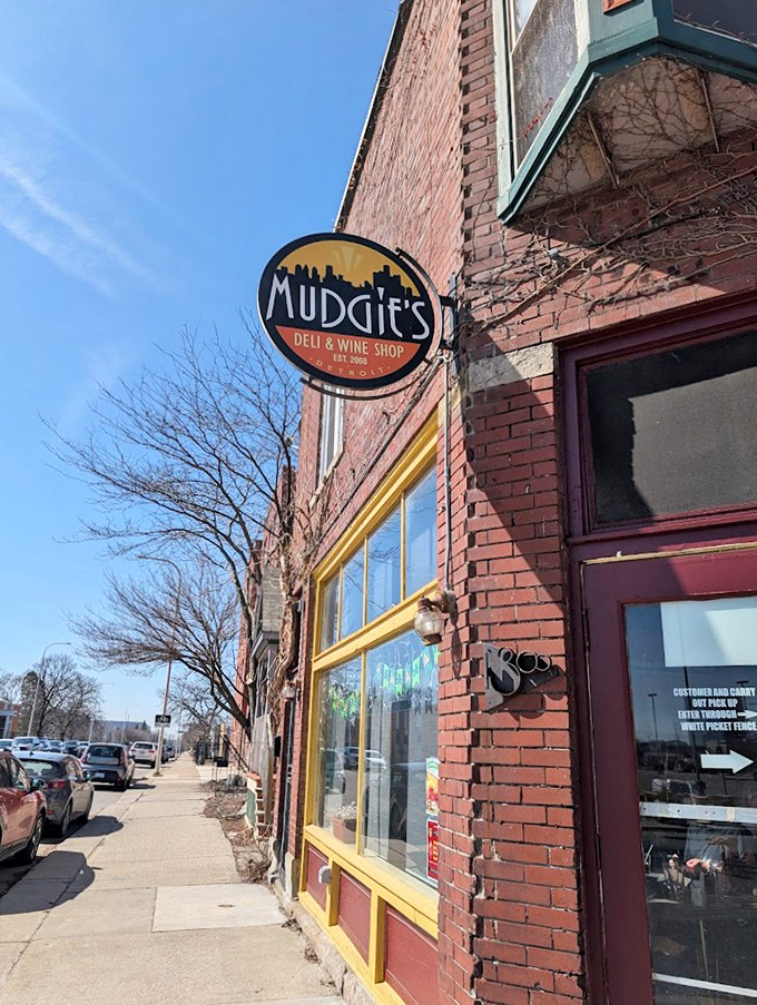 Sunshine highlights Mudgie's distinctive sign &ndash; a beacon of sandwich excellence in Detroit's historic Corktown.