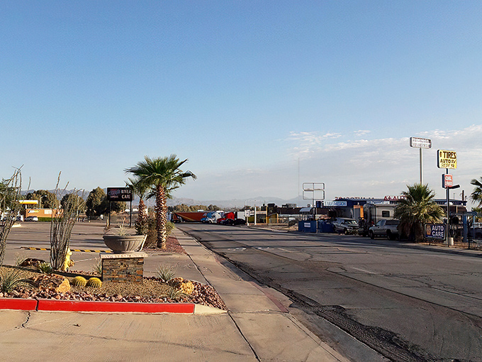 Downtown Needles embraces its desert identity with pride. Those palm trees aren't just for show&mdash;they're survival experts!