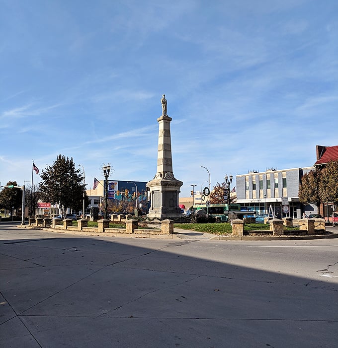Monument squares that anchor communities like lighthouses guide ships safely home to harbor.