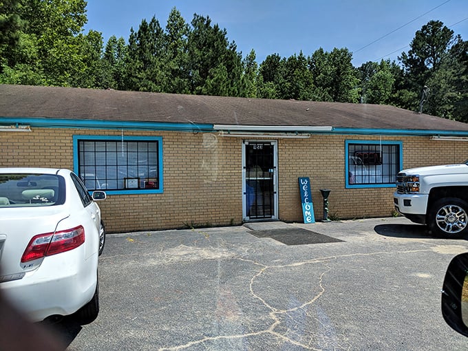 Blue window frames peek out from yellow brick walls, promising homestyle cooking that'll make you call your mother with newfound respect.