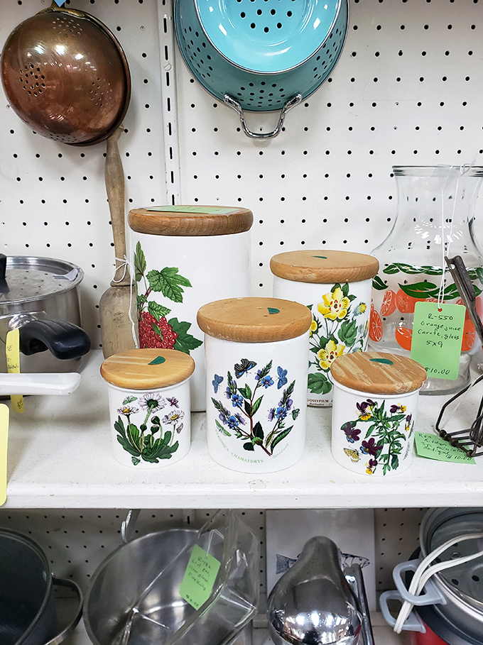 Beautiful vintage kitchenware awaits at the Opportunity Shop. These floral canisters are practically begging to brighten someone's countertop!