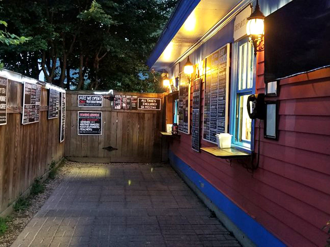 As twilight falls, Peterson's Ice Cream Depot glows like a dessert oasis for weary travelers.