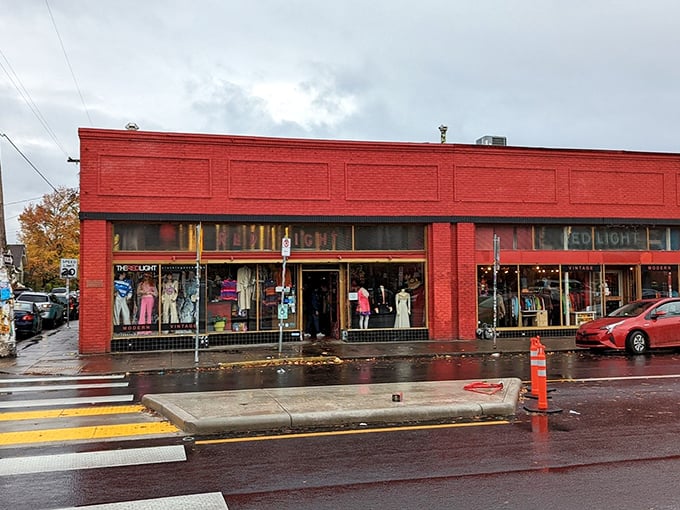 Rain-slicked streets can't dampen the appeal of Red Light's eye-catching display windows. Vintage fashion waits for no weather in Portland.