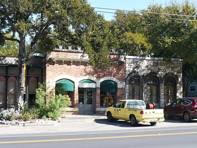 This tree-lined main street feels like stepping into a Norman Rockwell painting that's actually affordable.