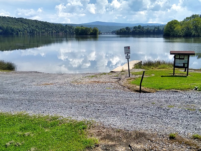 A wooden dock invites contemplation at Shawnee State Park, where the hustle of everyday life dissolves into rippling waters.