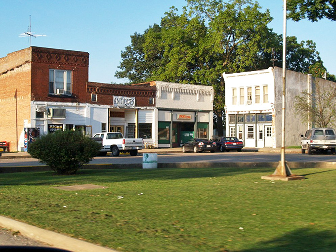 Small-town main streets like this one prove that community spirit thrives where everyone waves when passing.