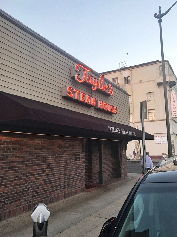 Taylor's neon sign glows like a beacon for steak aficionados. This unassuming storefront hides one of LA's most beloved culinary institutions.