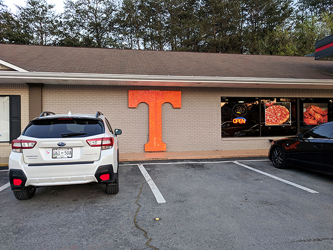 Who knew a gas station could fuel your pizza cravings? Tennessee Pizza Company's humble exterior hides delicious secrets.