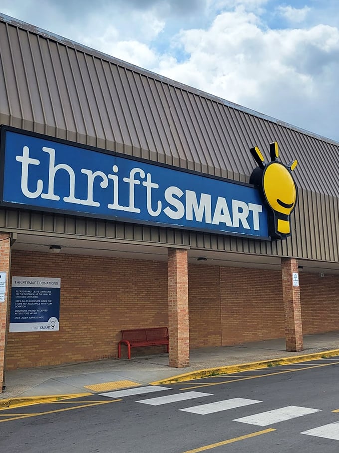 The smiling lightbulb of ThriftSmart welcomes bargain hunters. It's like the store itself is winking at you, promising hidden gems inside! 