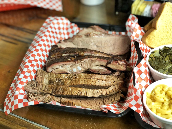 The holy trinity of barbecue: perfectly sliced brisket, sides that know their supporting role, and the promise that nap time follows immediately after consumption.