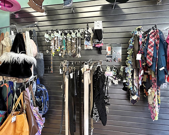 The accessories wall&mdash;where belts, scarves, and jewelry hang like trophies of fashion hunts past, ready for their next adventure.