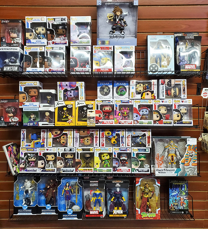 A collector's dream wall of pop culture royalty. These boxed figures aren't toys&mdash;they're investments with plastic smiles and impressive resale value.