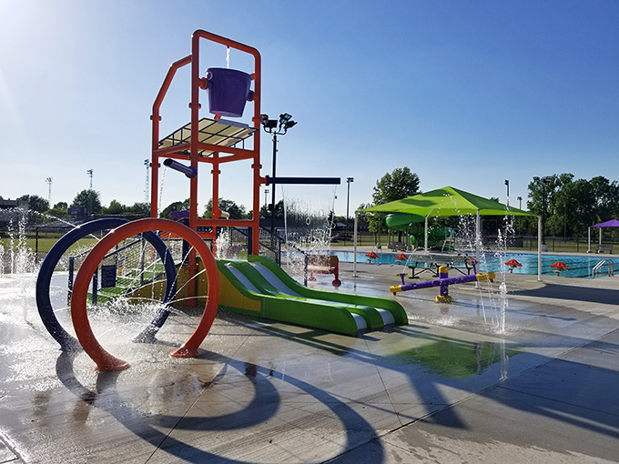 Summer salvation! Ada's splash pad transforms scorching Ohio afternoons into a symphony of squeals and cooling mists.